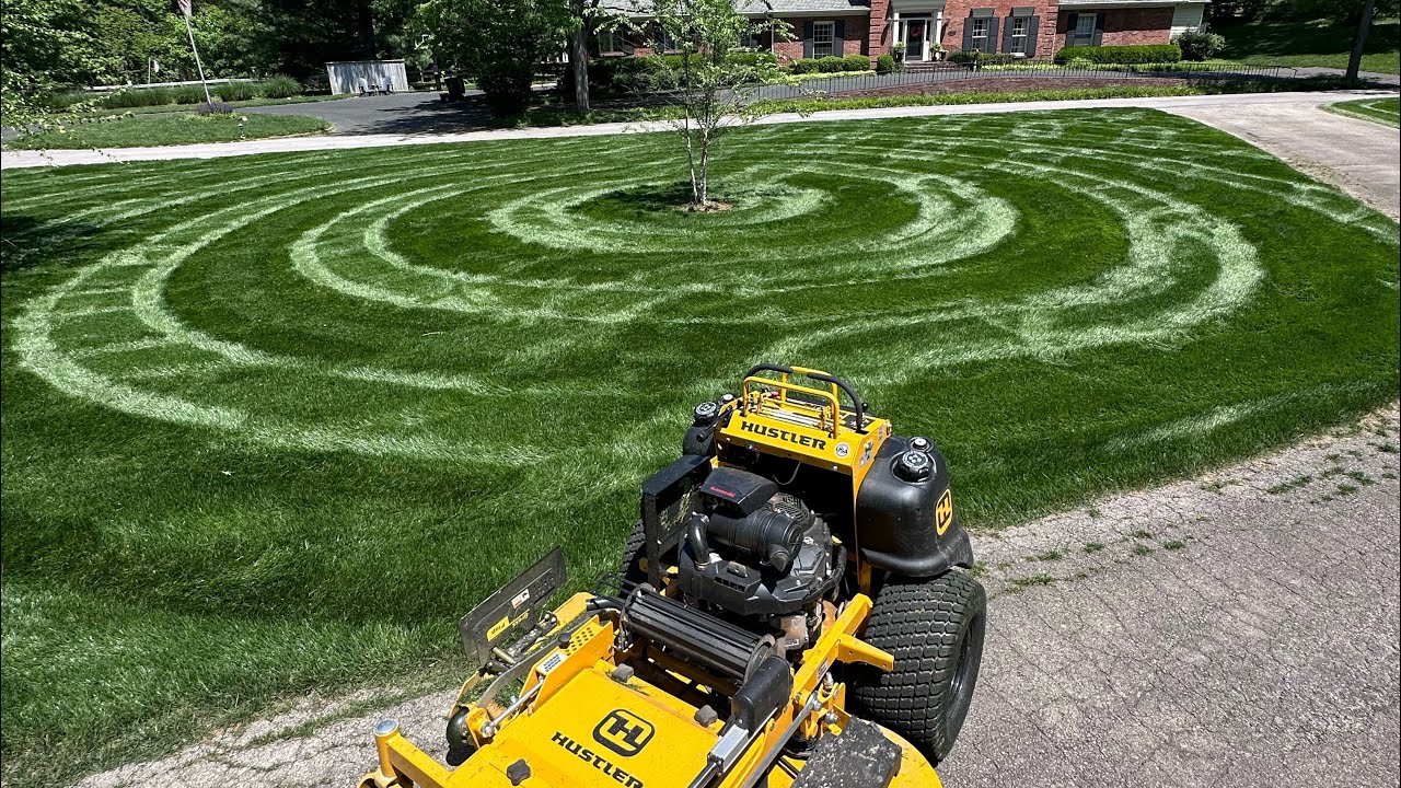 Making crop circles in the lawn using a Hustler Super SF - YouTube