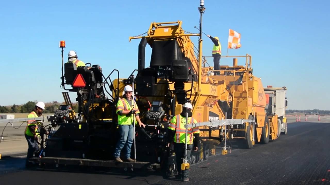 Custom-Configured Cat Paver Helps Contractor Meet Runway Specs - YouTube