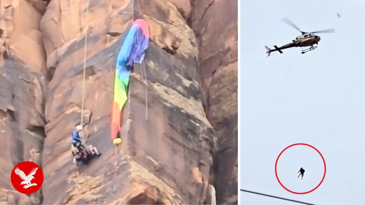 Base jumper dangling from Utah canyon saved by helicopter crew - YouTube
