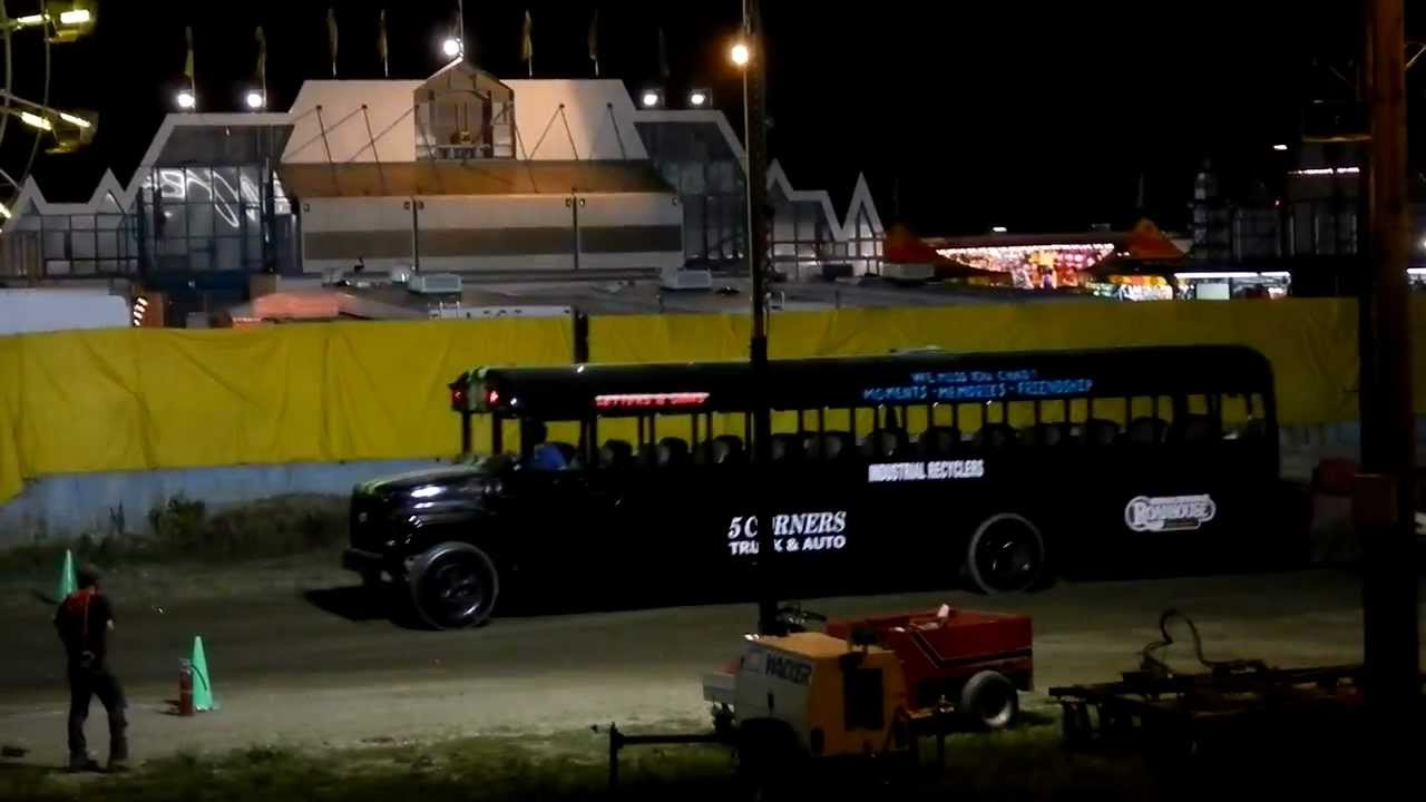 demolition derby bus doing tractor pull and crash - YouTube