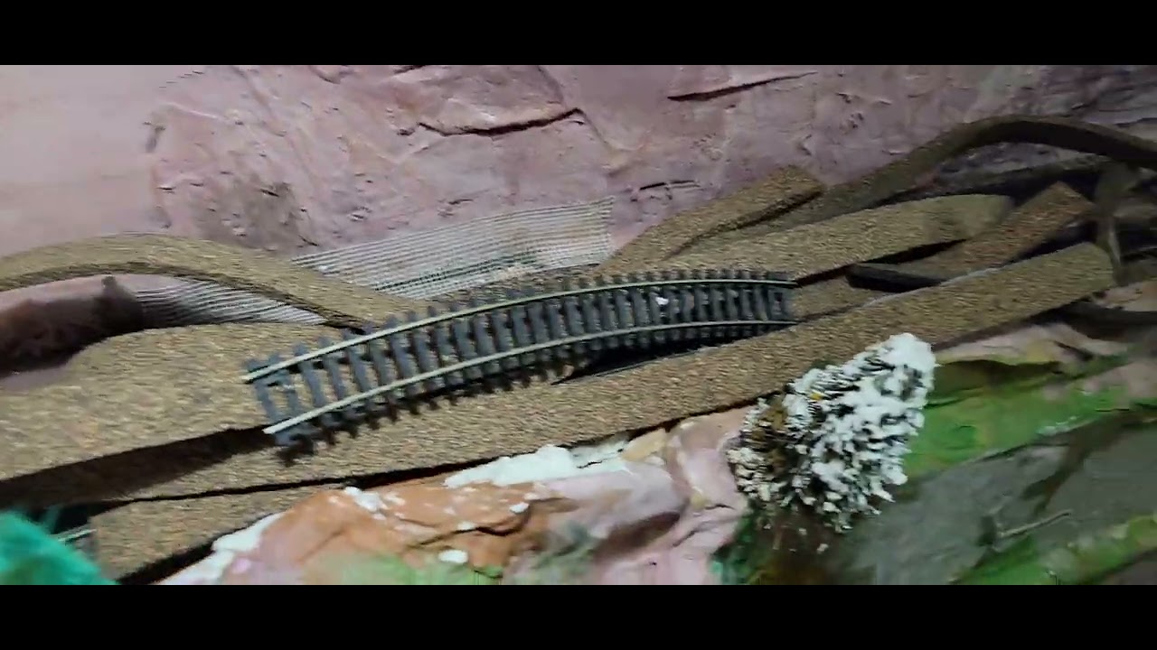 Progress on adding second main line track to HO layout - YouTube
