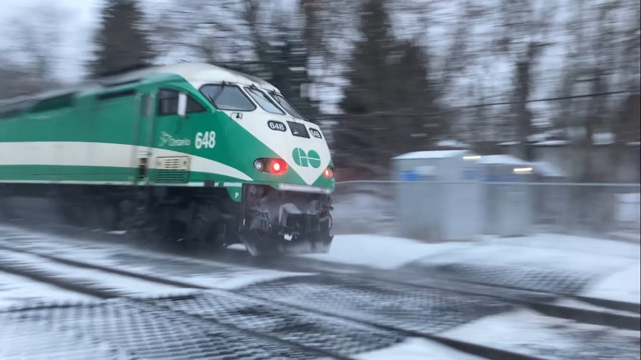 GO Trains with old cab cars and Via Trains passing through Rosebank ...