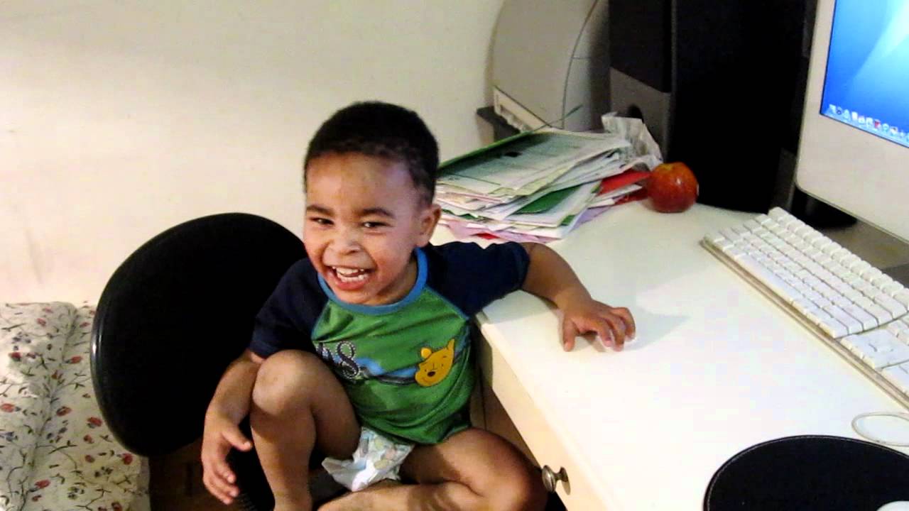 Toddler laughs hysterically at talking computer - YouTube