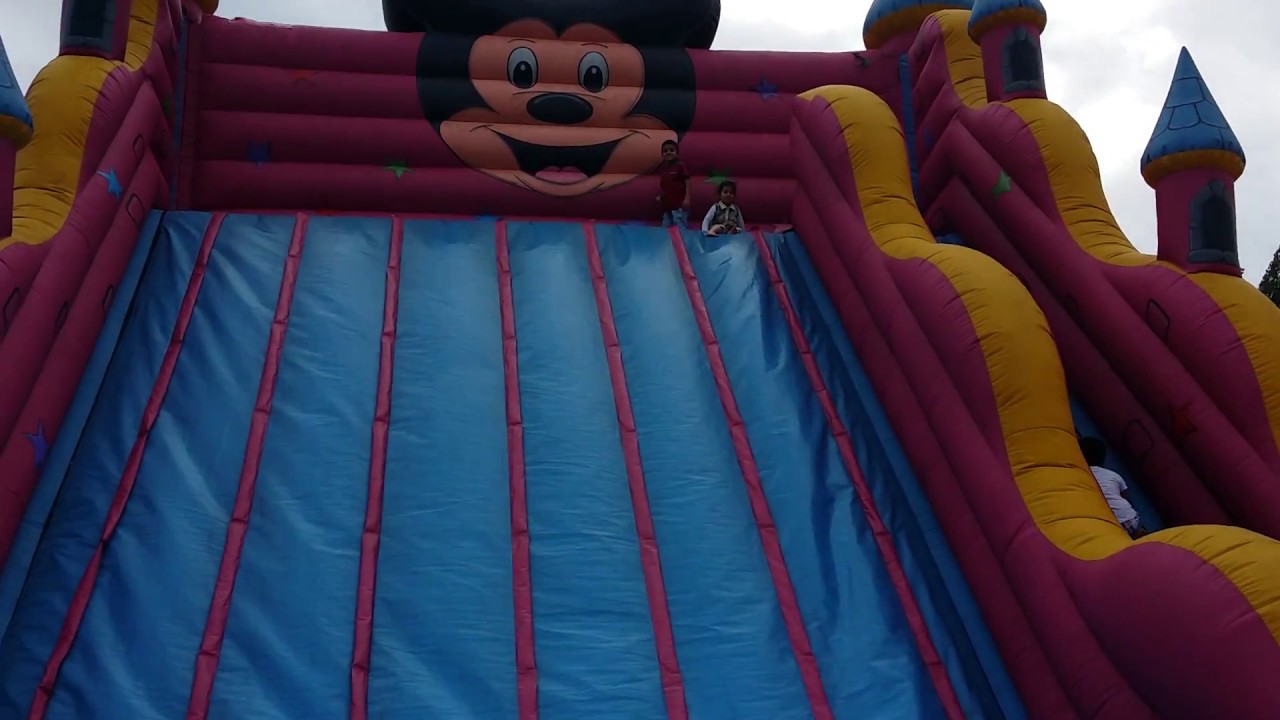 Inflatable Slide Fun Fair in Cringle Park Levenshulme Manchester - YouTube
