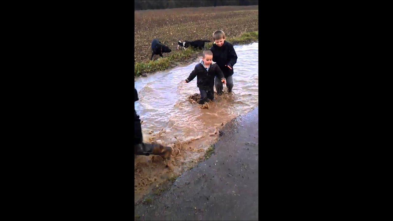 Boy falls down in Puddle fun, - YouTube
