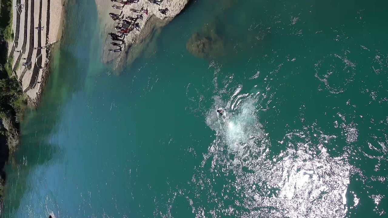 Diving from the Stari Most bridge in Mostar - YouTube