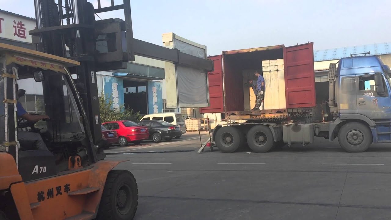 Glass loaded into container - YouTube