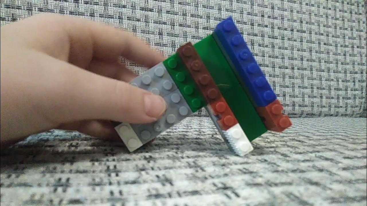 построил пистолет из лего который может стрелять лего детальками - YouTube