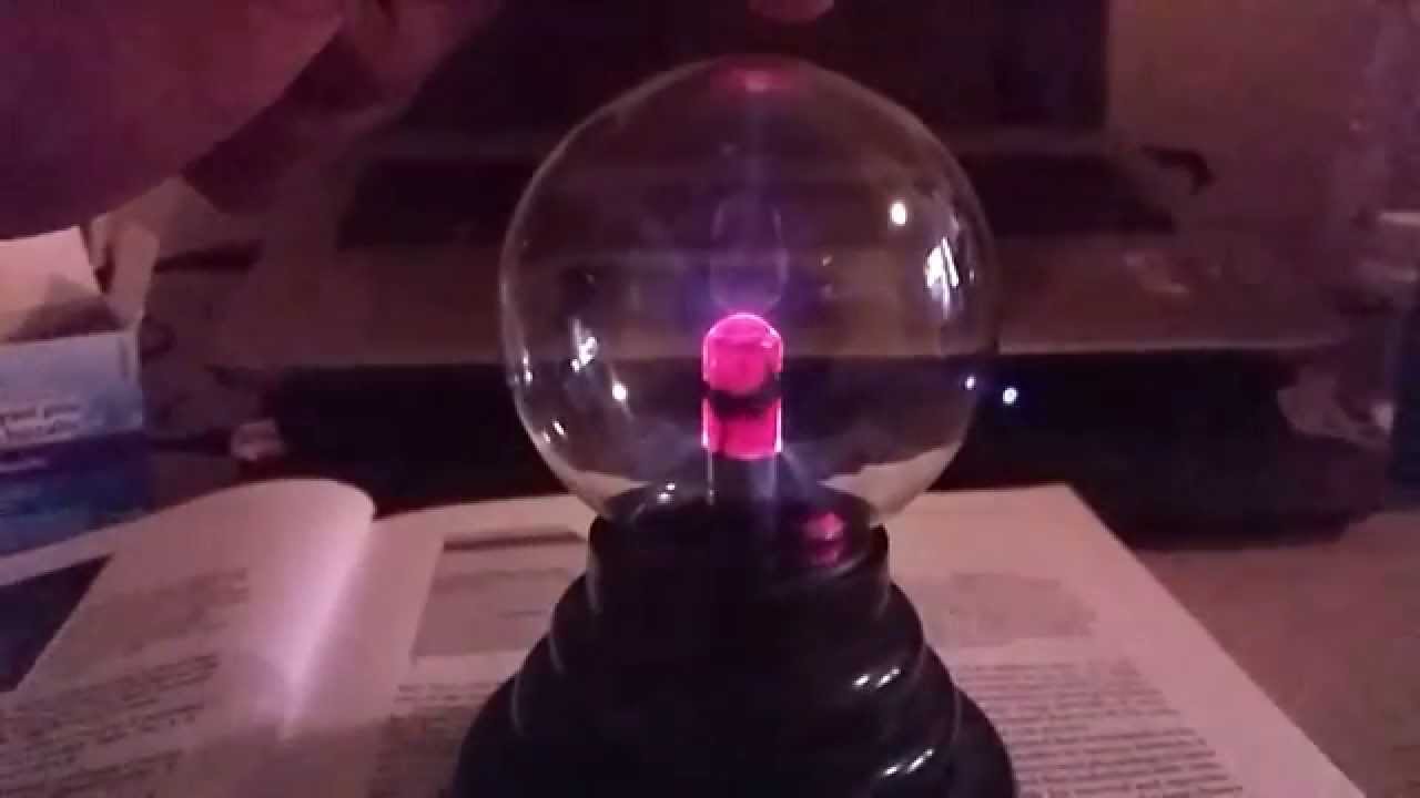 Formation of a plasma bolt in a plasma ball in slow motion - YouTube