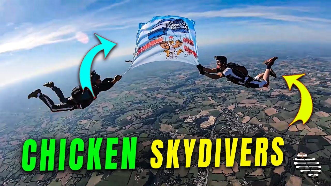 Skydivers Holding a Chicken Flag Mid-Air - YouTube