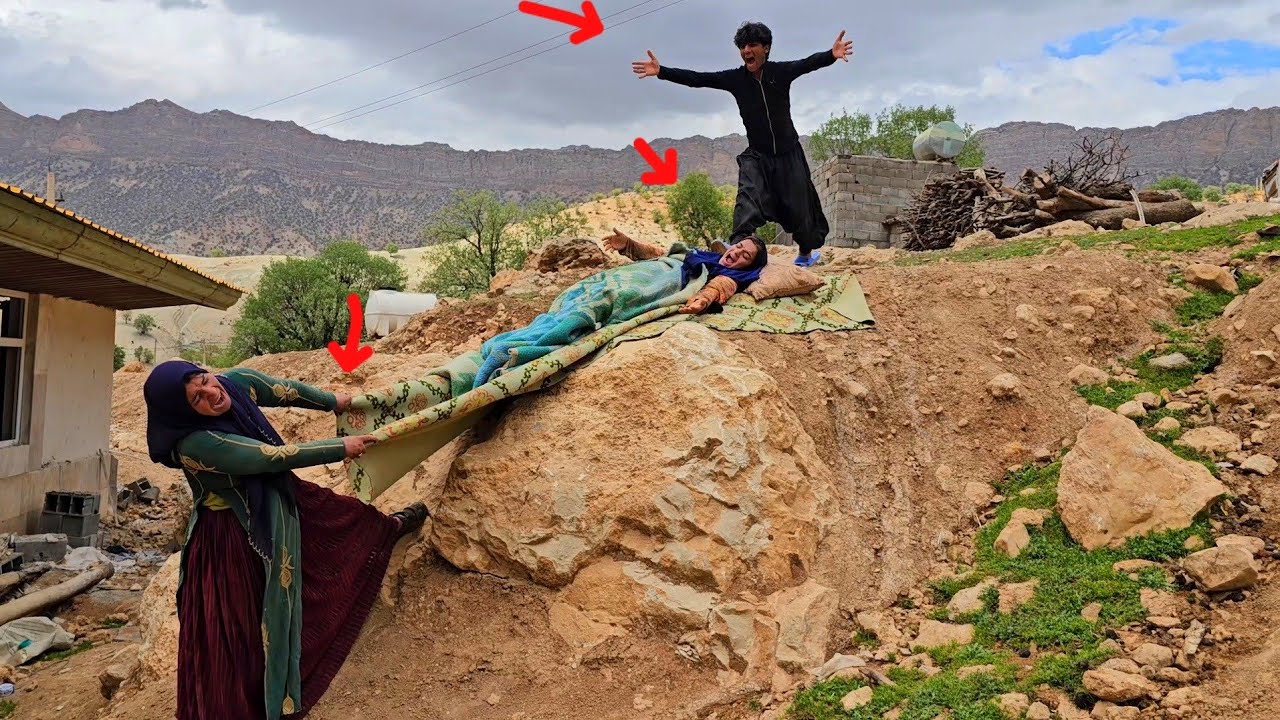 The second woman is thrown off a cliff by the first woman to catch ...