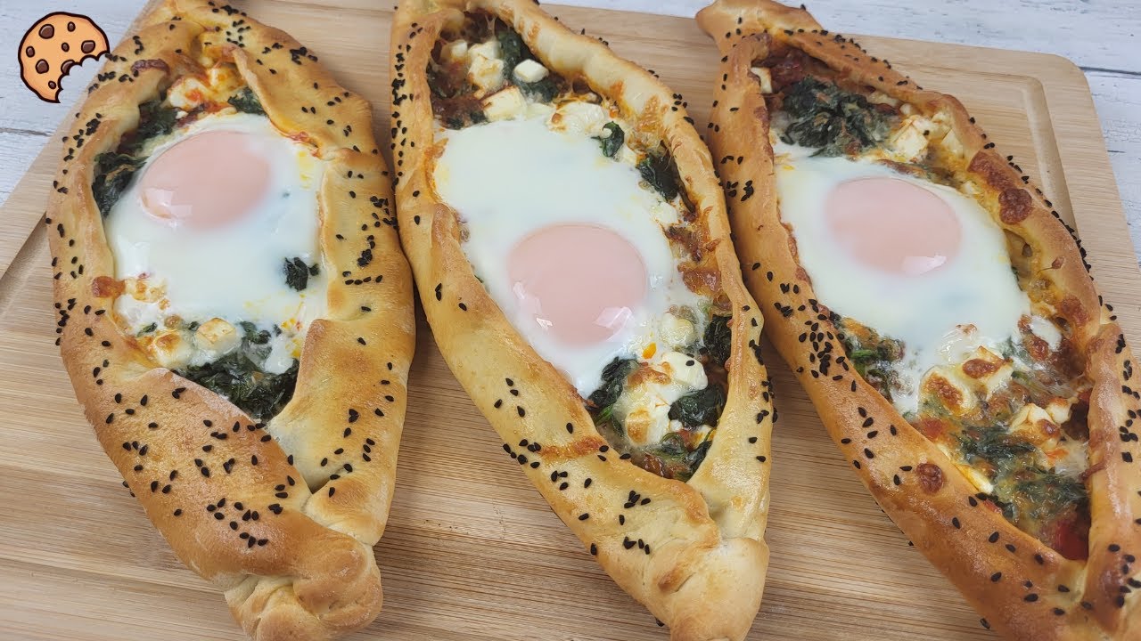 Incredibly tasty Turkish pide with meat, spinach and cheese filling ...