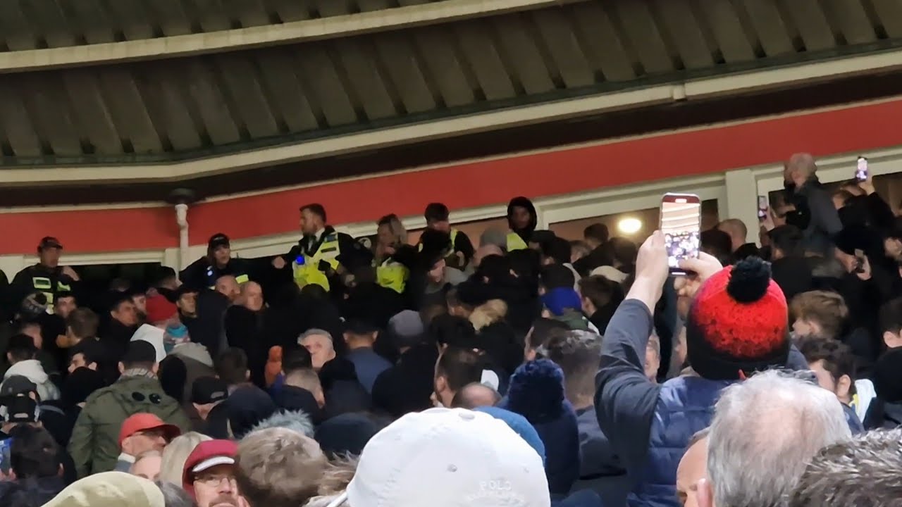 Football fans on same side fighting each other - YouTube