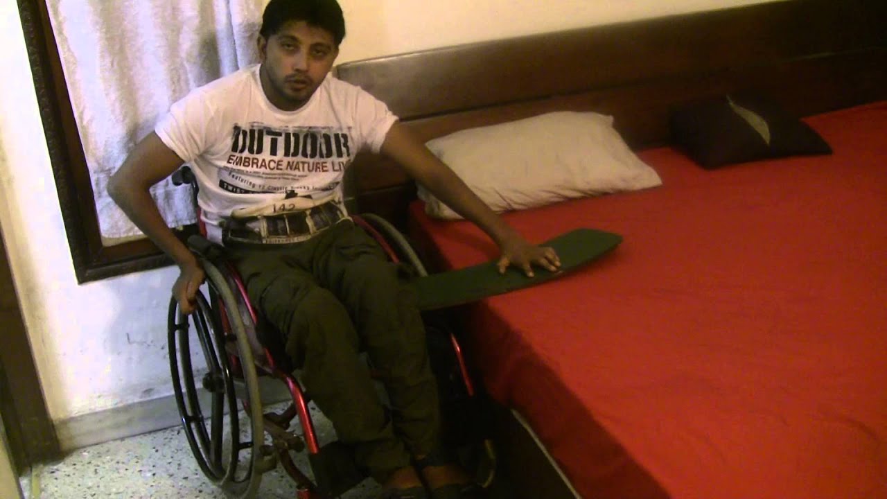 How to Shift from Wheelchair to Bed with Shifting Board - YouTube