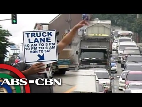 One lane policy for trucks on C-5 begins - YouTube