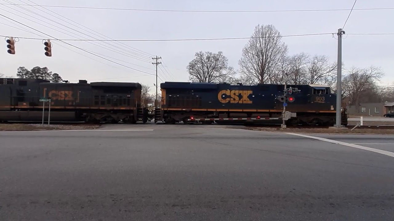 CSXT 903 leads CSX C319 at Clinton SC on the CSX Monroe Subdivision ...
