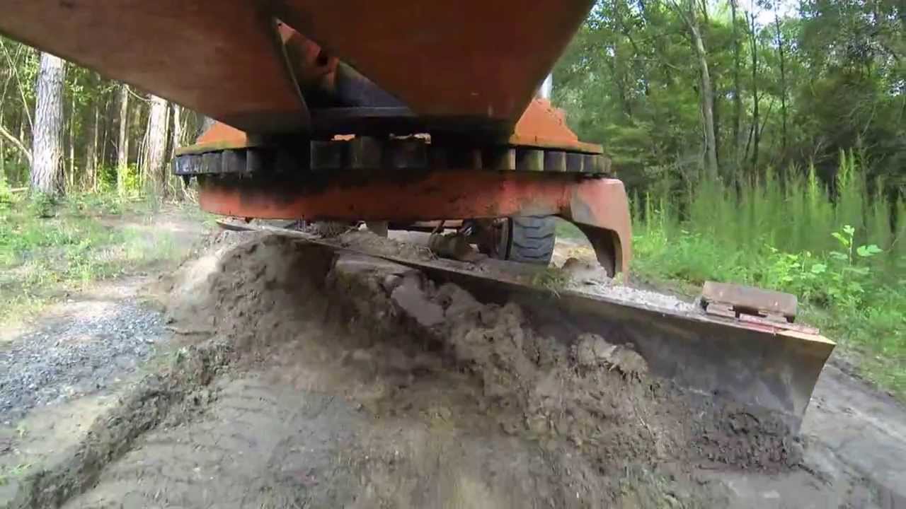 Motor Grader Grading Road - YouTube