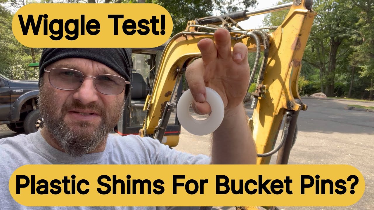 Caterpillar Mini Excavator gets bucket shims - YouTube