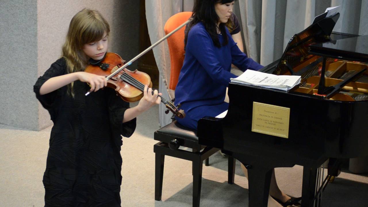 Ilva Eigus (8) plays Bach E-major violin concerto BWV 1042 (1st ...