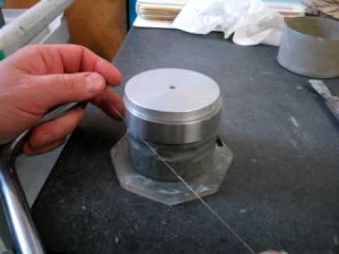 How to trim a soil sample for Consolidation Testing - YouTube