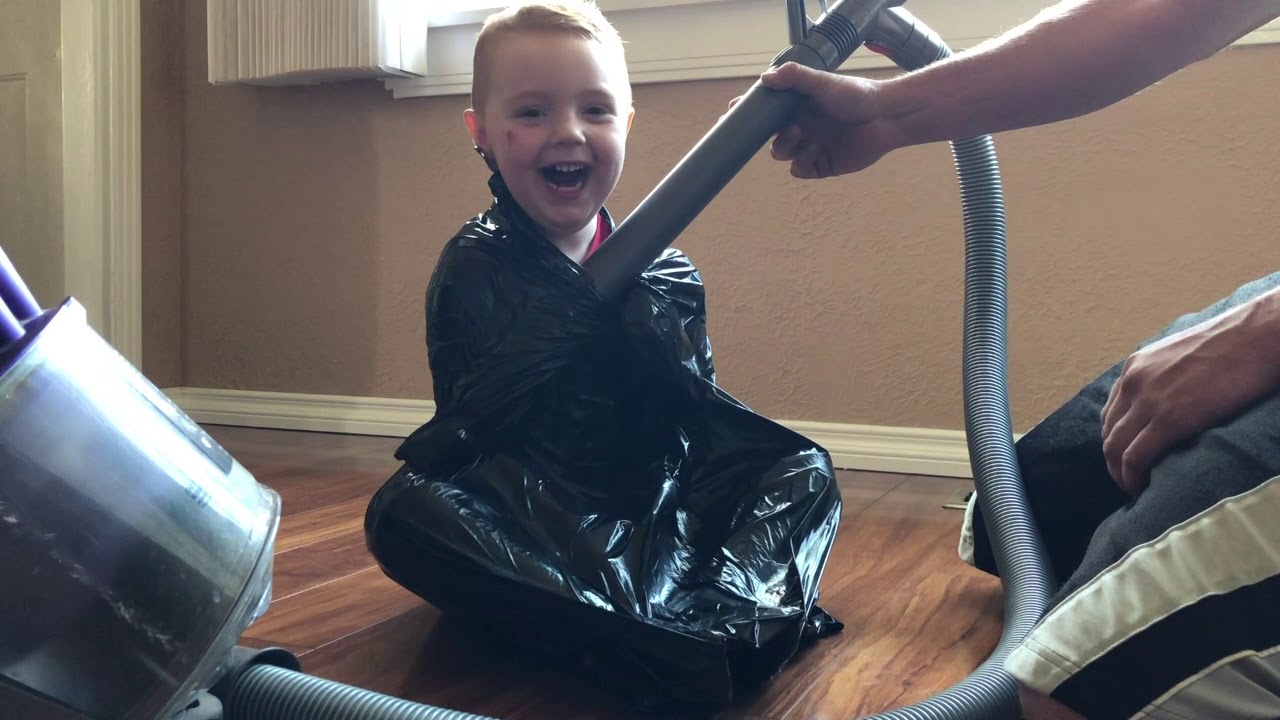 Toddler shrink wrapped by father - YouTube