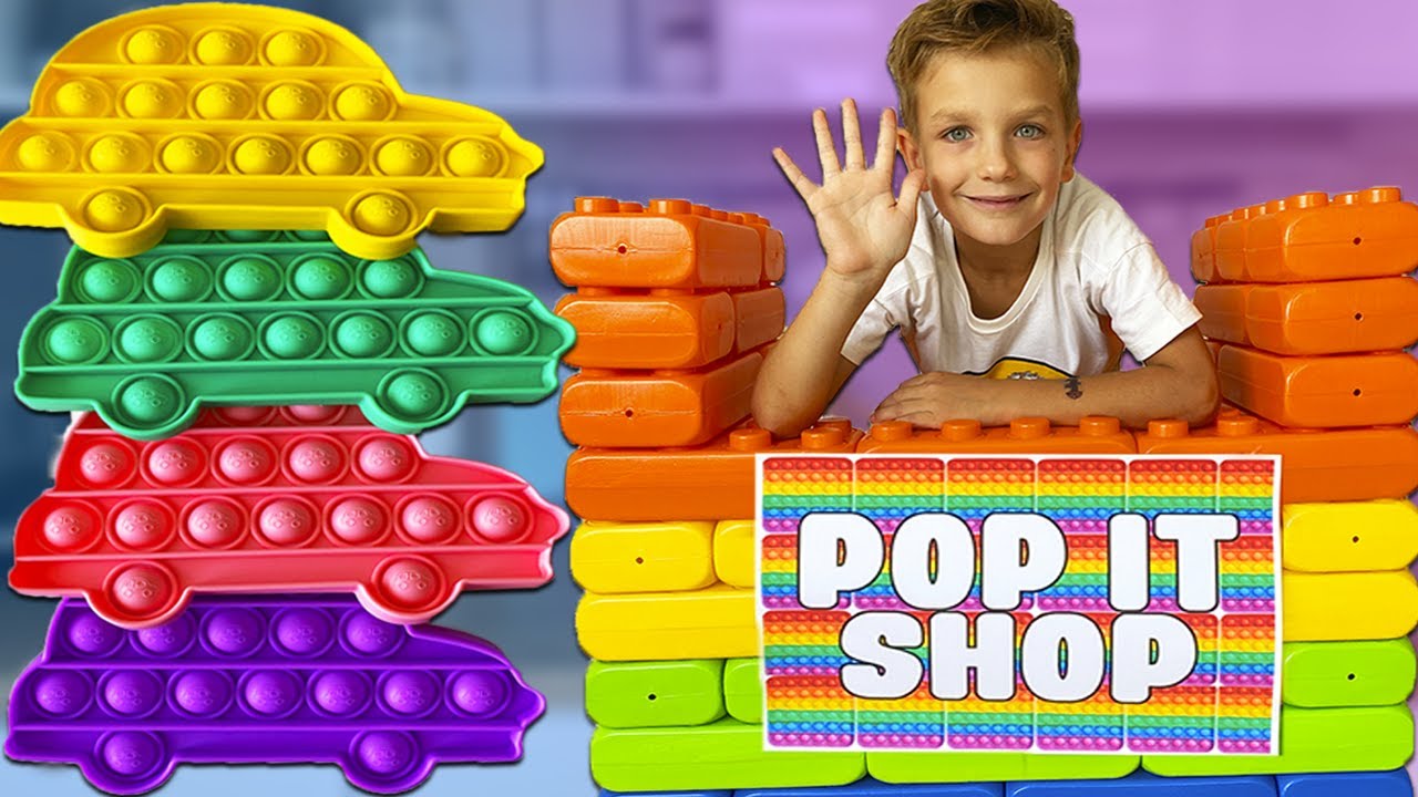 Mark bought new pop it cars in a pop it shop - YouTube