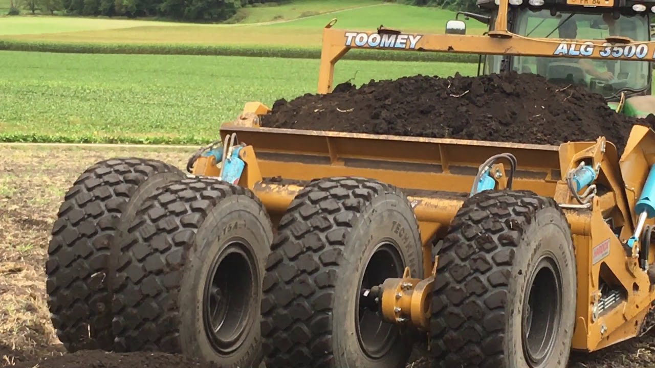 Maxime Guillod is stripping topsoil with his TOOMEY 3500B Scraper ...
