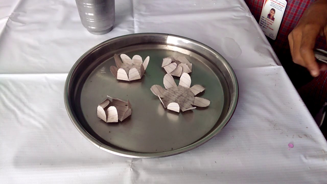 Paper flower in water. - YouTube