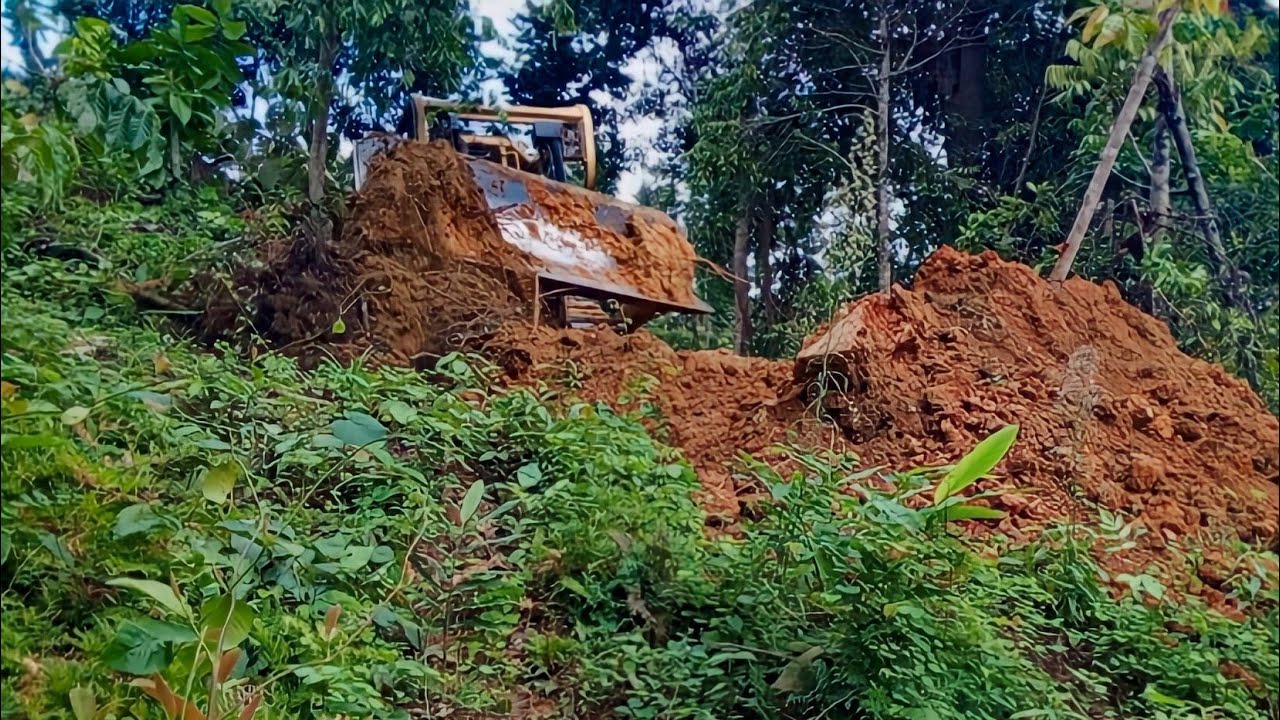 Cutting hills for new road opening in the mountains using the CATERPILLAR BULLDOZER D6R XL - YouTube