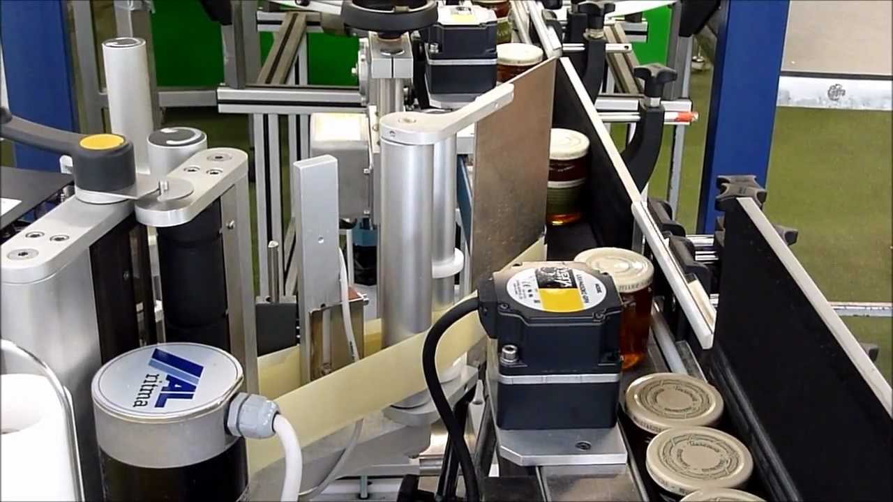 Tracklements ALline C Wraparound Jar Labelling System - YouTube