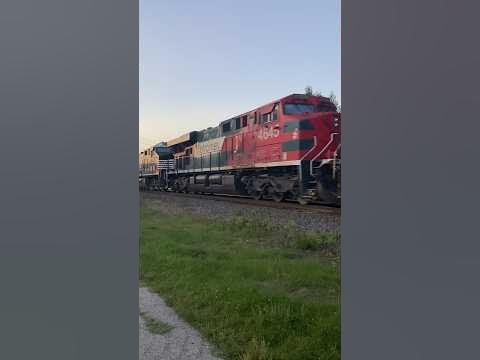 CN train with FXE 4645, NS 4251 and NS 4115 trailing - YouTube