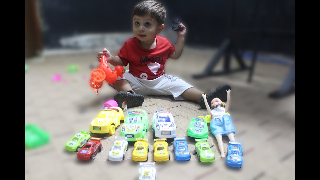 Haroon playing with doll I zia toys - YouTube