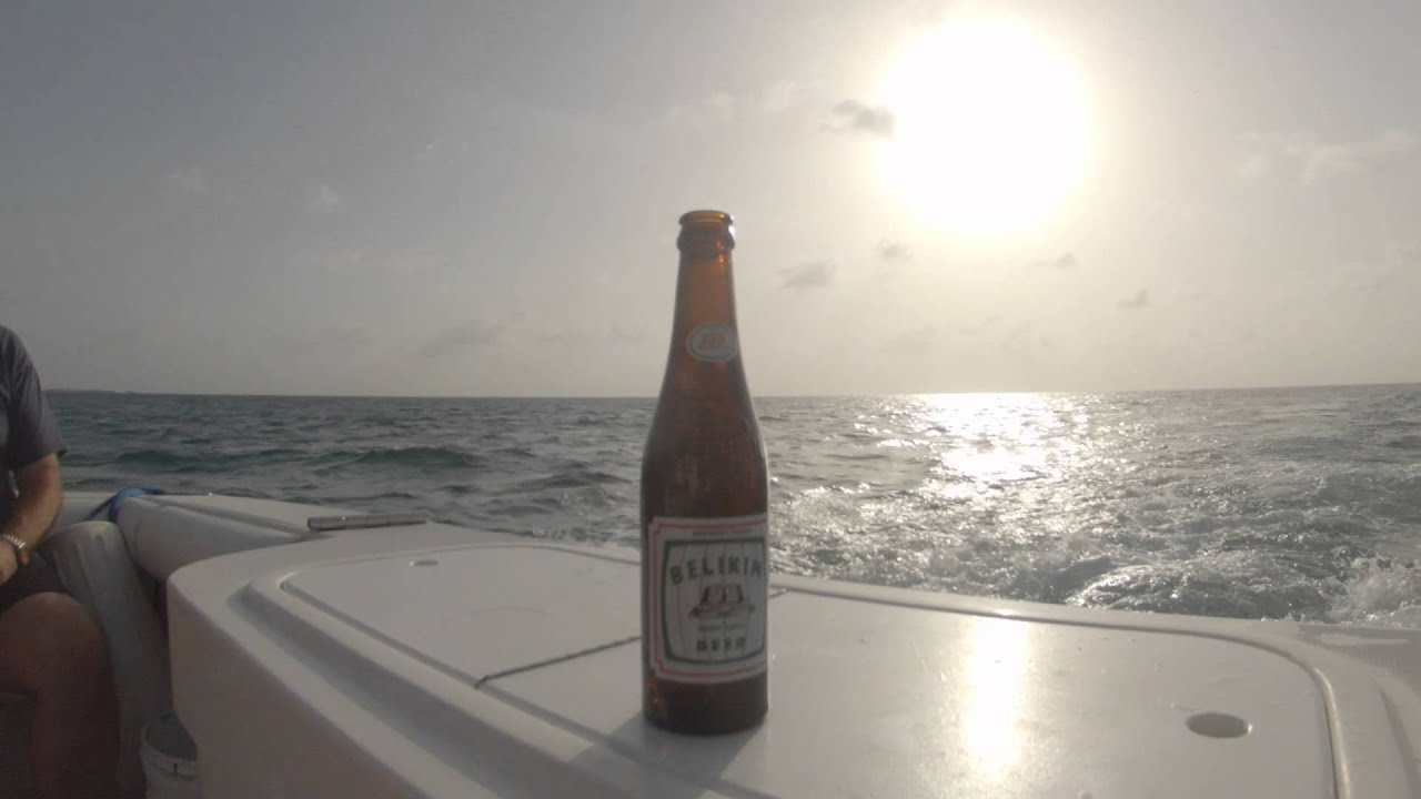 Ice Cold Belikin on the Boat in Belize - YouTube