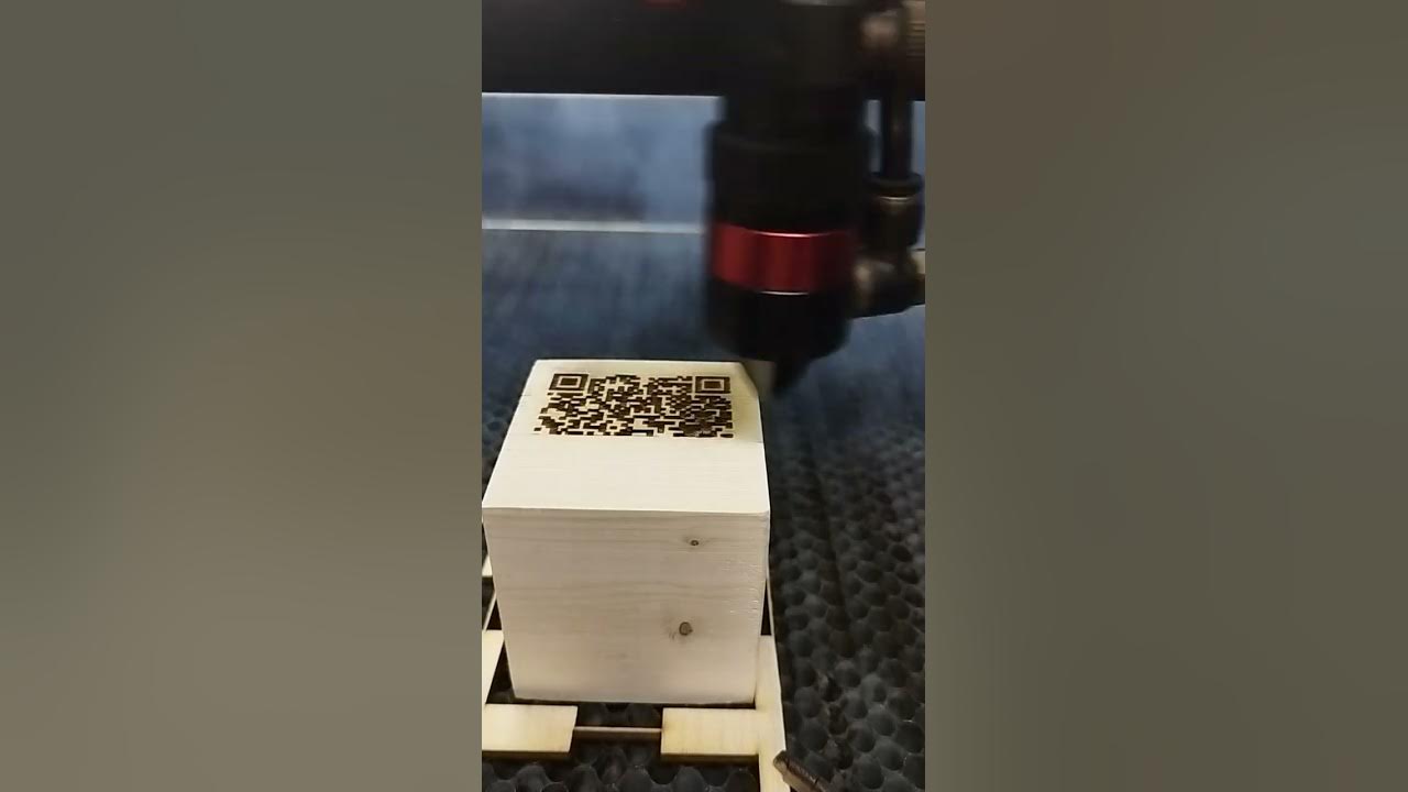 laser engraving qr code on wood cube - YouTube