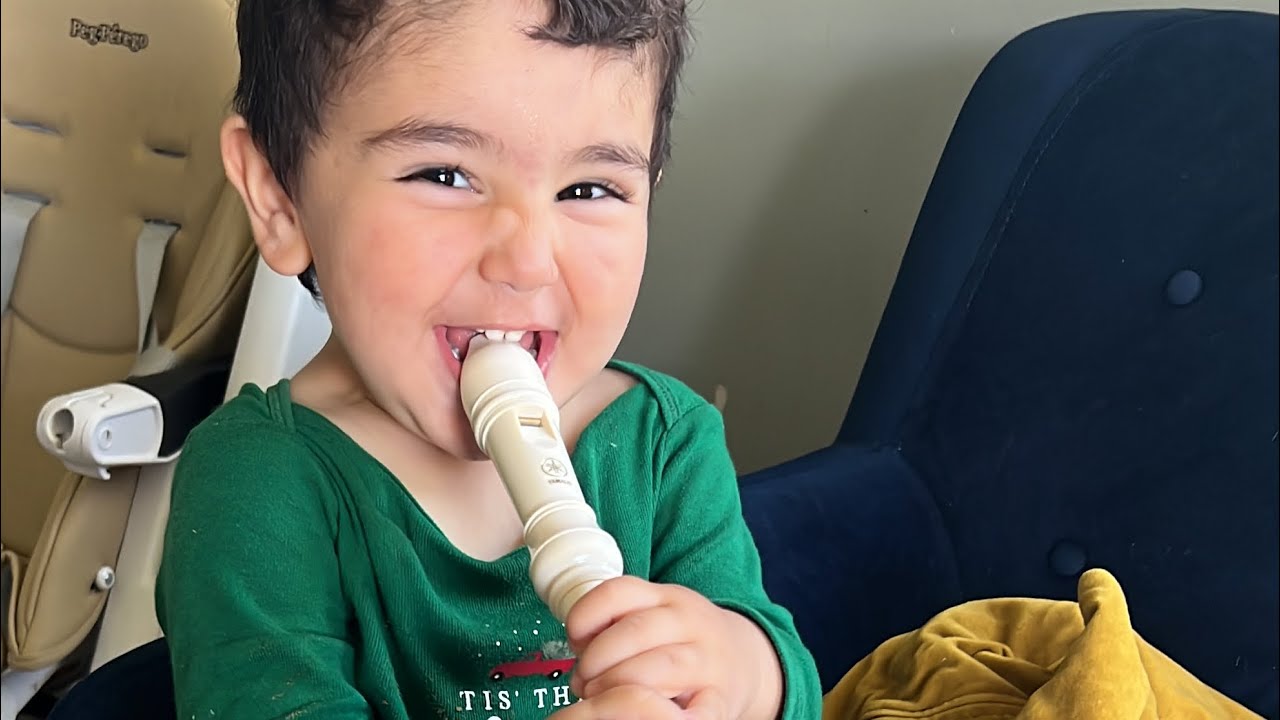 Baby playing flute 🪈🤷😆 - YouTube