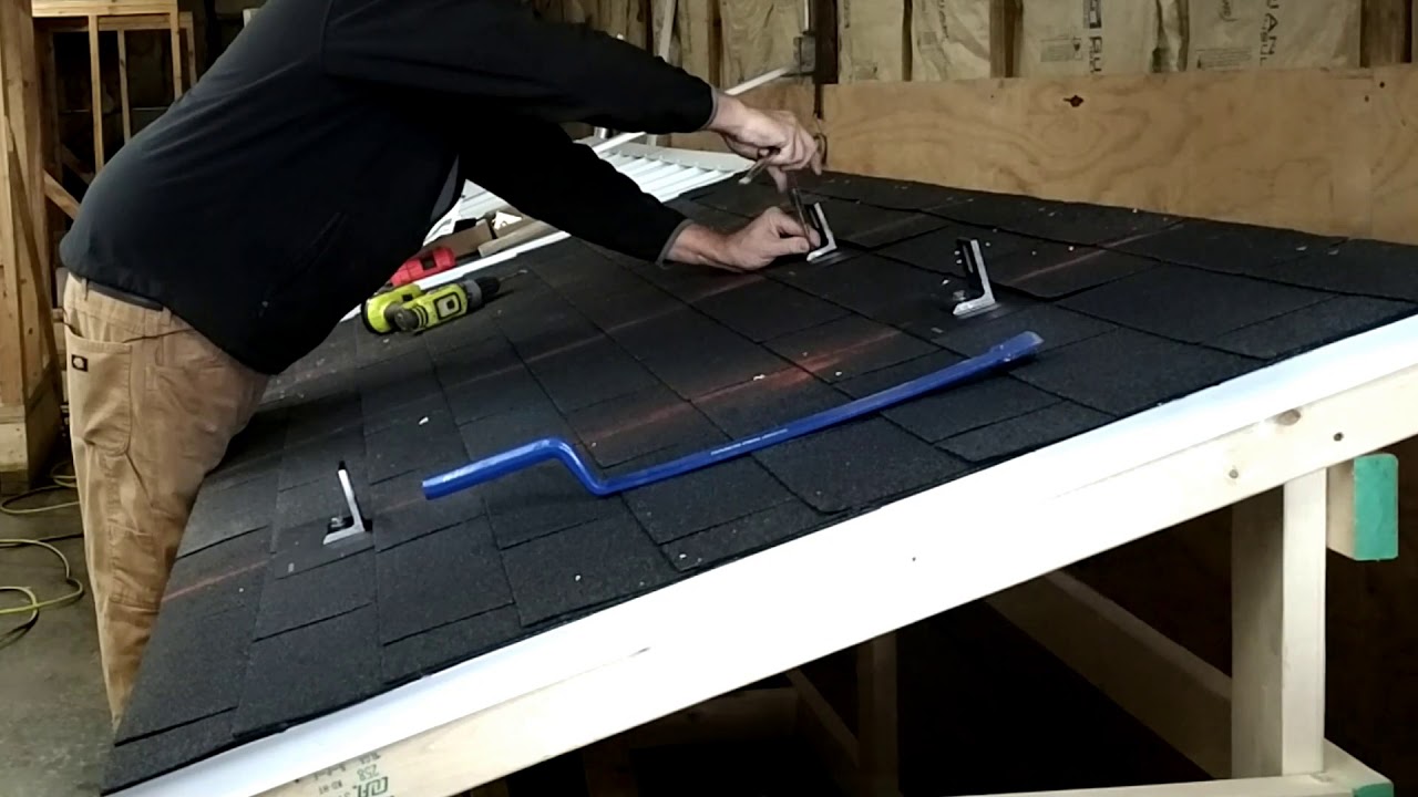 Installing a Unirac Rooftop Mounted PV Rail System - YouTube