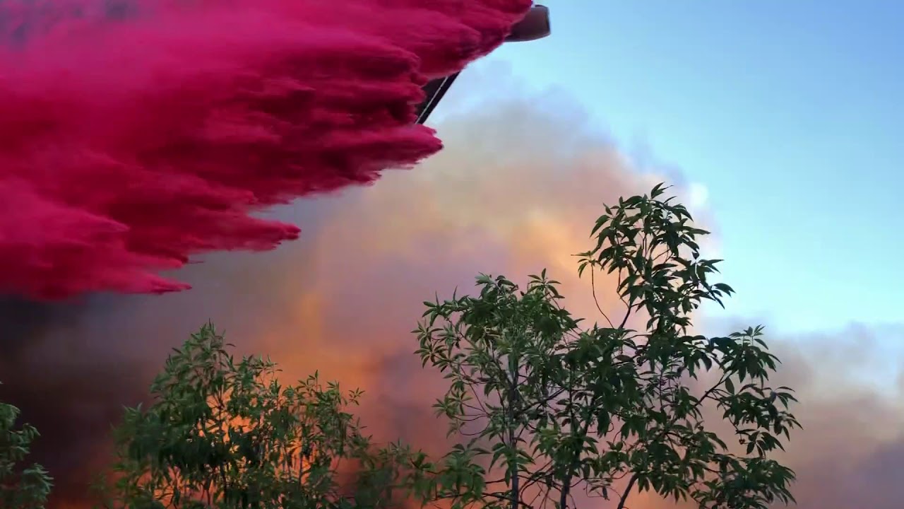 Planes Drop Fire Retardant on Flames in Calabasas, California - YouTube