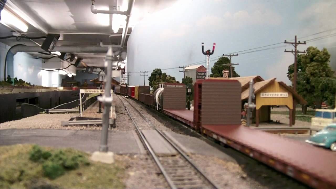 Long ho train entering a siding on bad track. - YouTube
