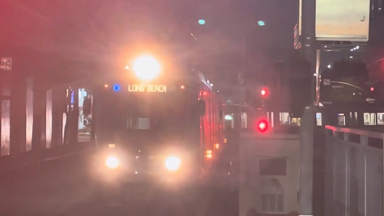 P2000 A line train approaches Grand LATTC station - YouTube