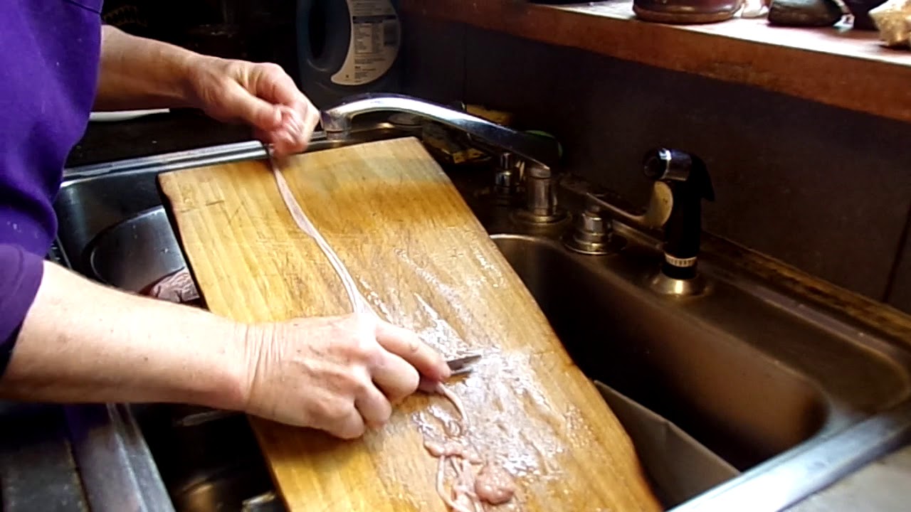 how to scrape hog intestines for sausage casings - YouTube