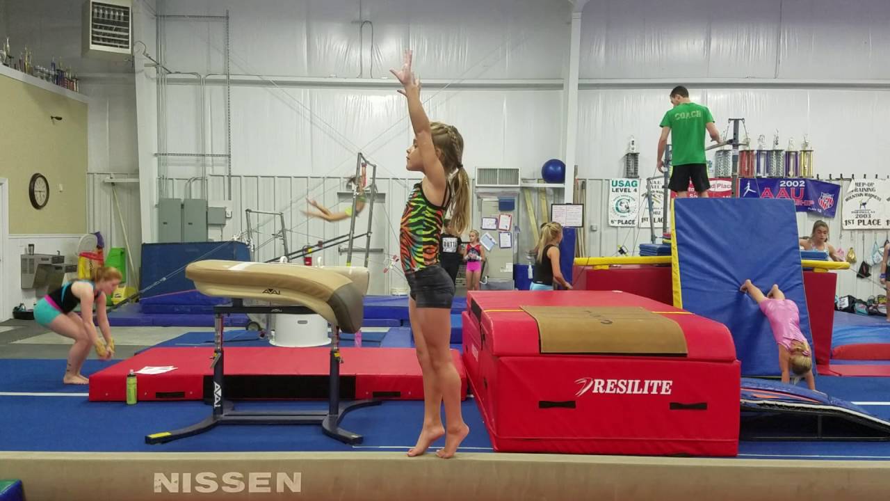 Relevé stand on beam - YouTube