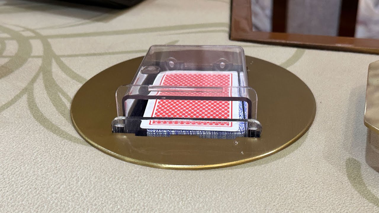 Placing cards into Baccarat discard bin. Training video & dealing ...