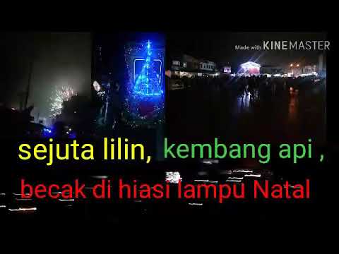 Acara sejuta lilin, dan kembang api, dan becak di hiasi lampu Natal ...