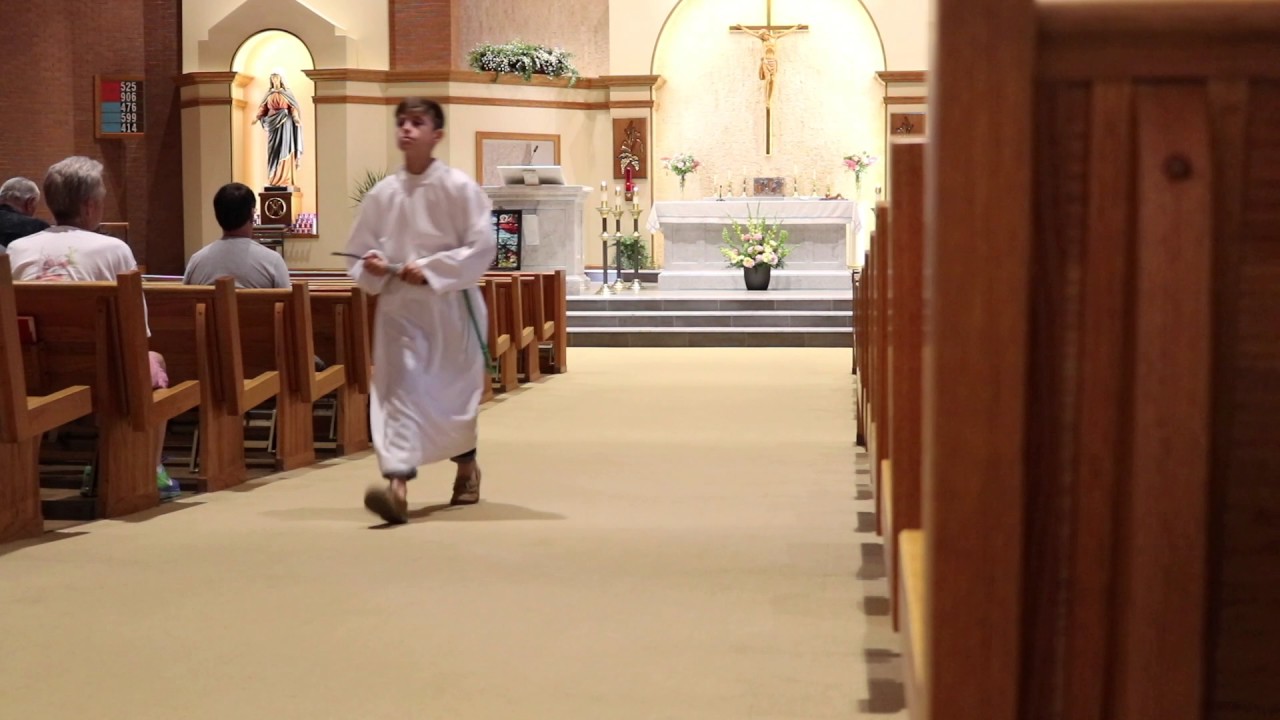 Parishioners gathering for Mass - YouTube