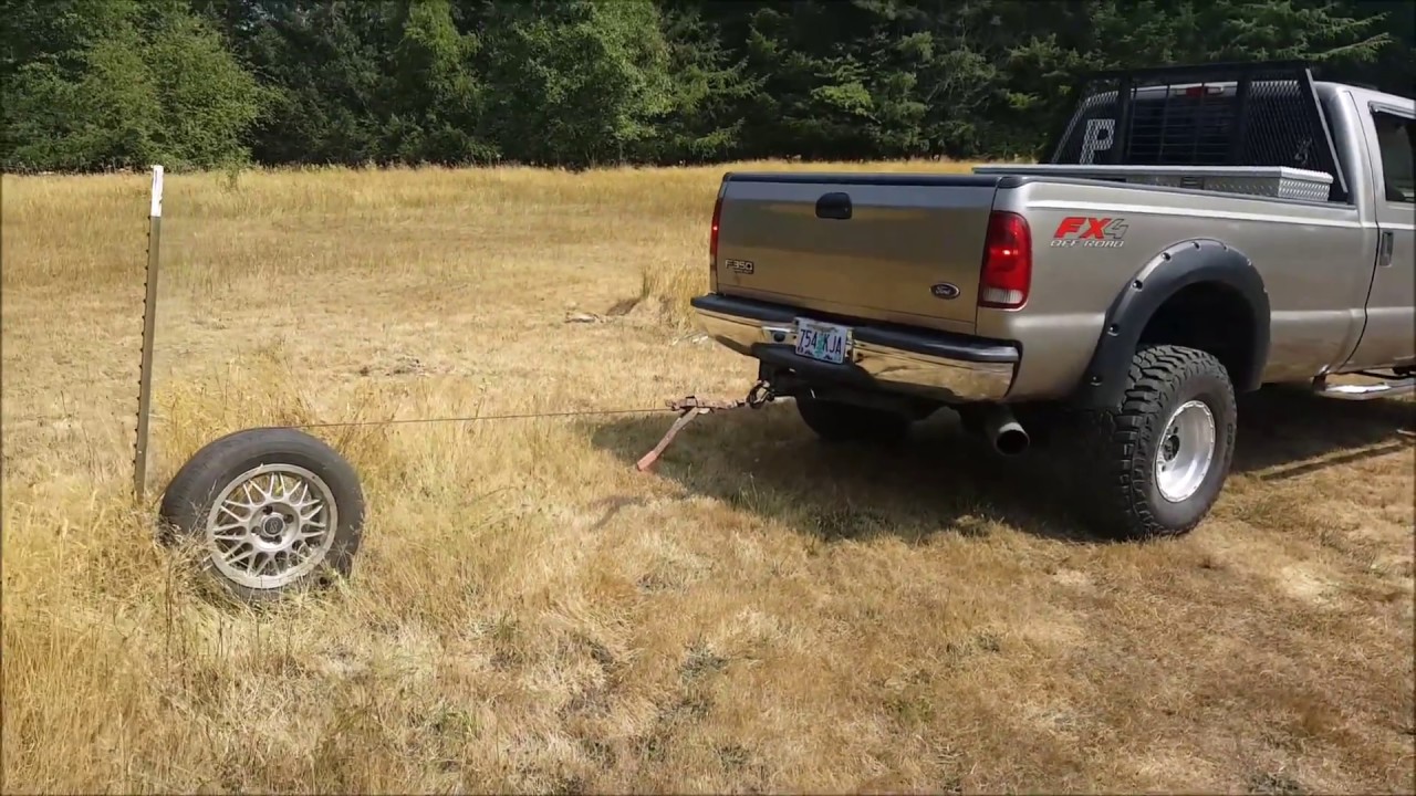 pulling posts with a wheel and truck - YouTube