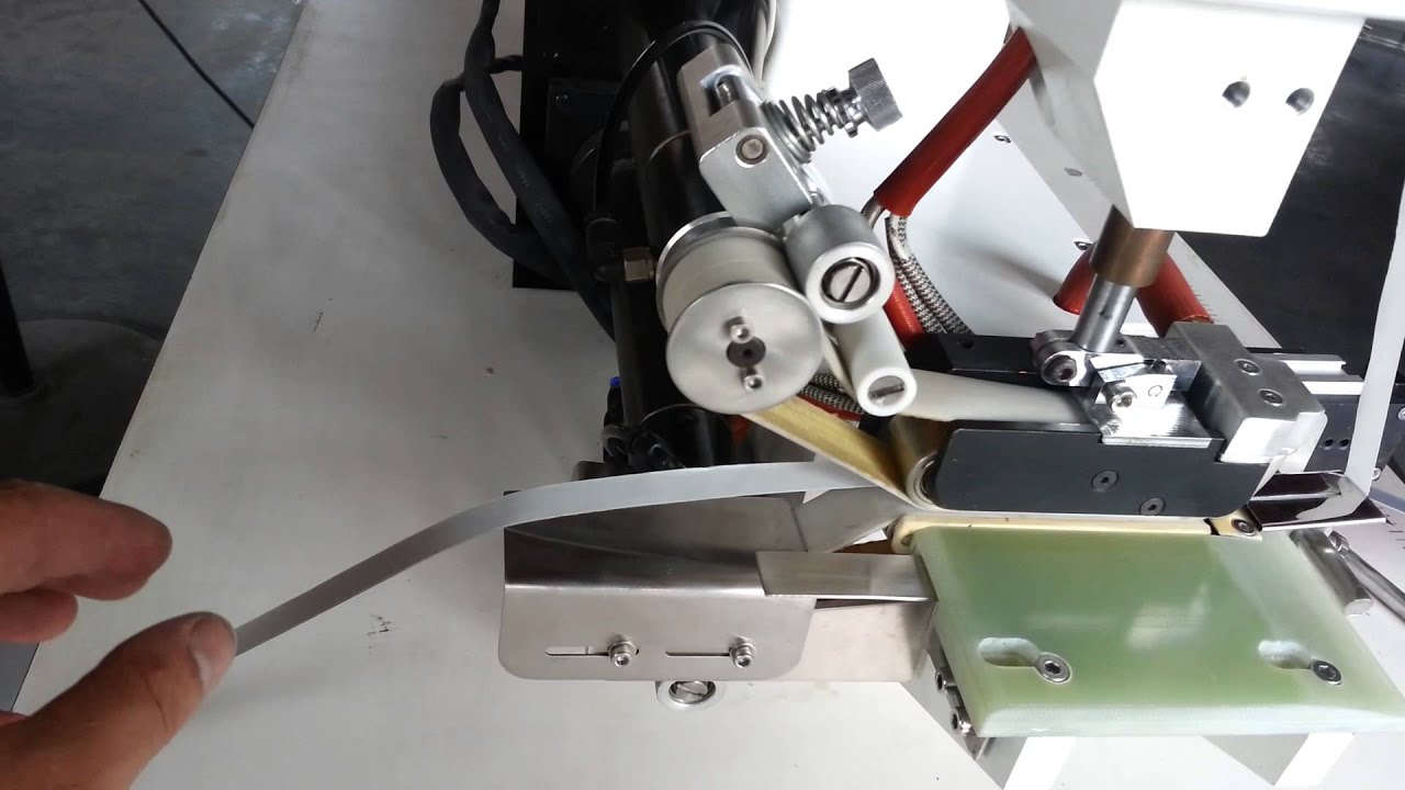 tape hemming bemis adhesive binding tape machine - YouTube
