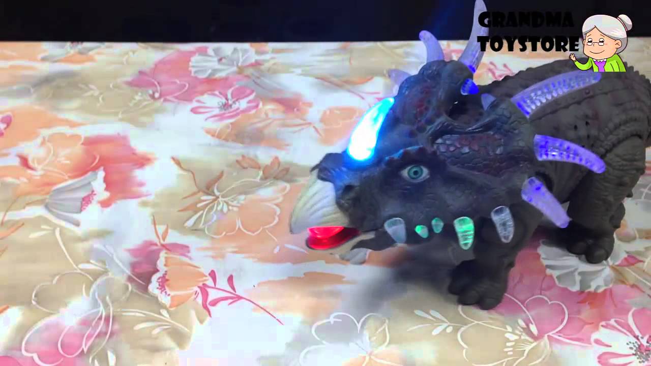 Unboxing TOYS Review/Demos - Moving crawing triceratops tail swining ...