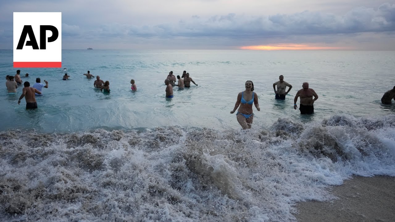 Dozens in Florida celebrate Groundhog Day by swimming in the ocean ...