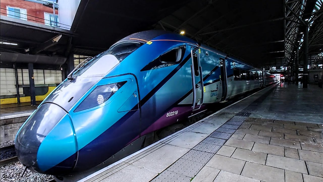The stunning TPE 'Class 802' departs Leeds with quite some throttle ...