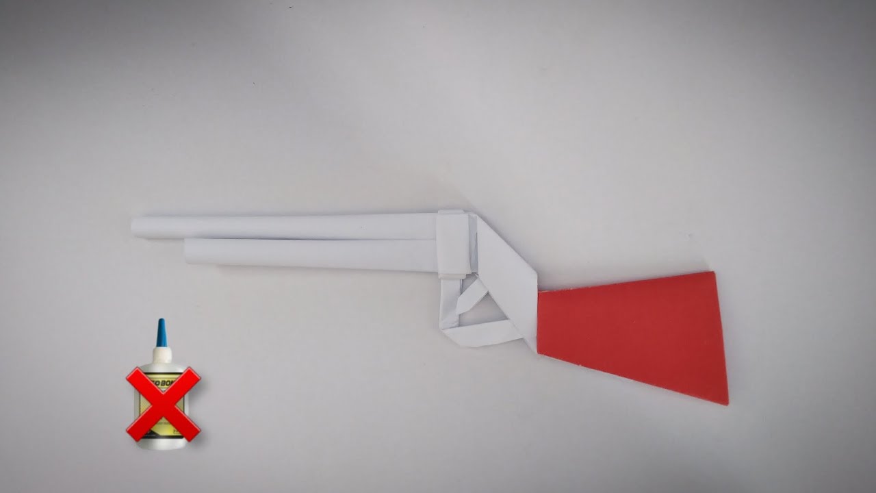 How to make a paper origami gun/ Making a paper origami gun in an easy ...